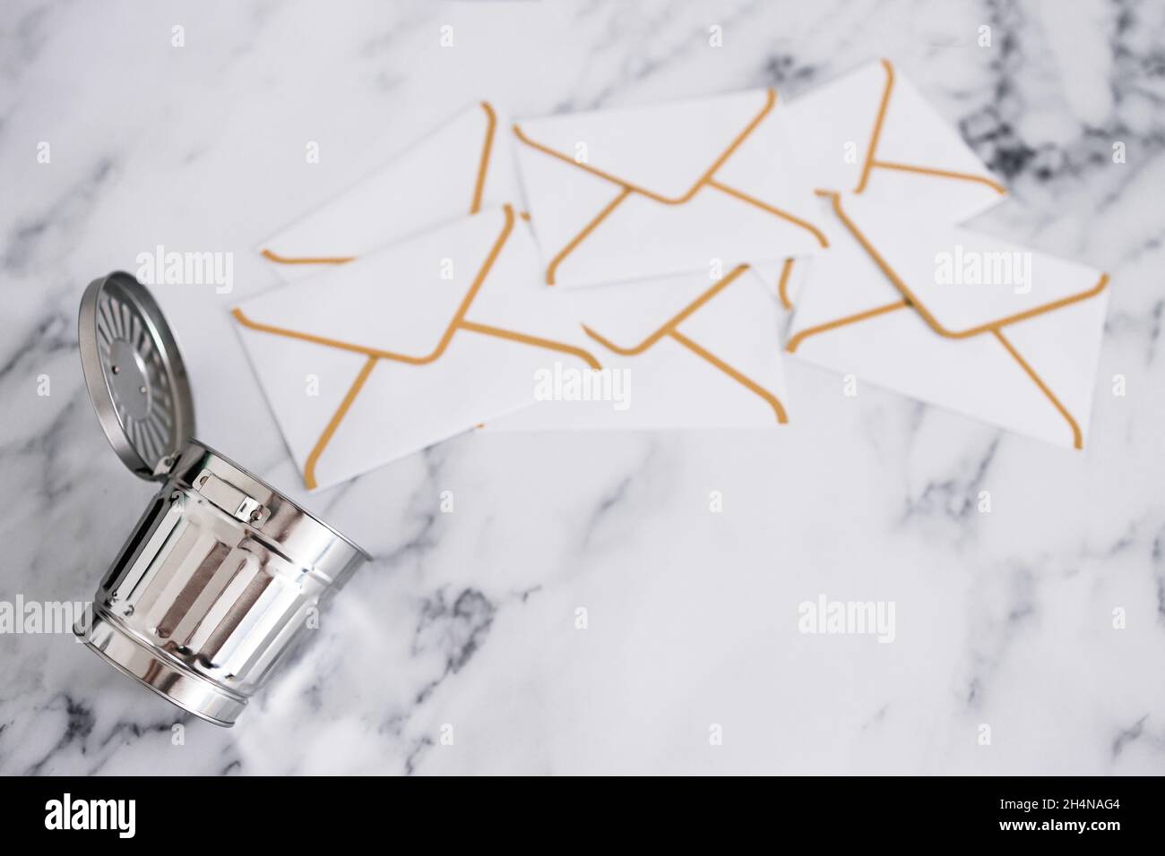 email or letter envelopes being trashed and flying into a recycling bin ...