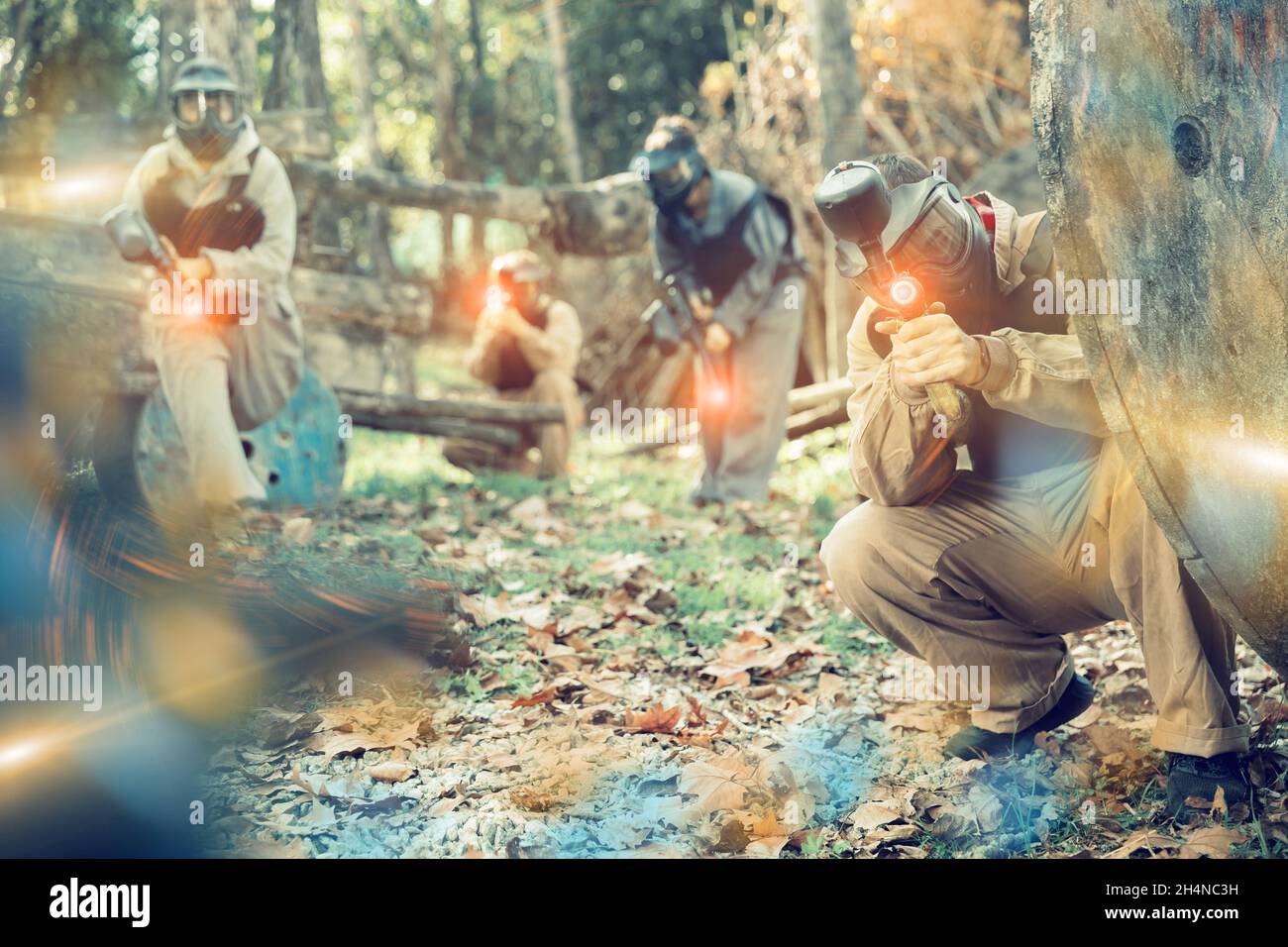 Paintball team aiming outdoors Stock Photo - Alamy