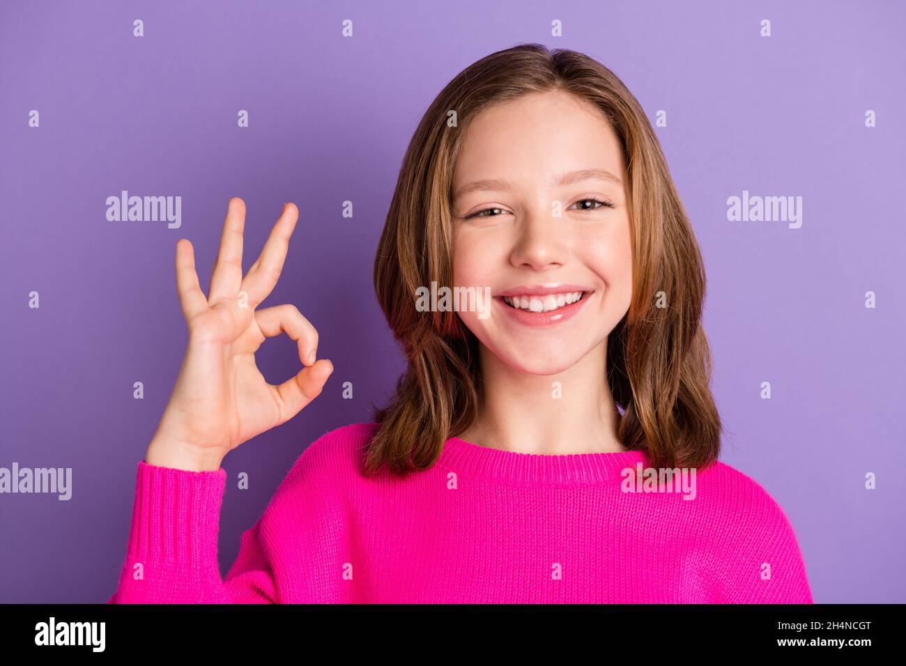 Photo of lovely cheerful young teenager girl make okay sign smile good ...