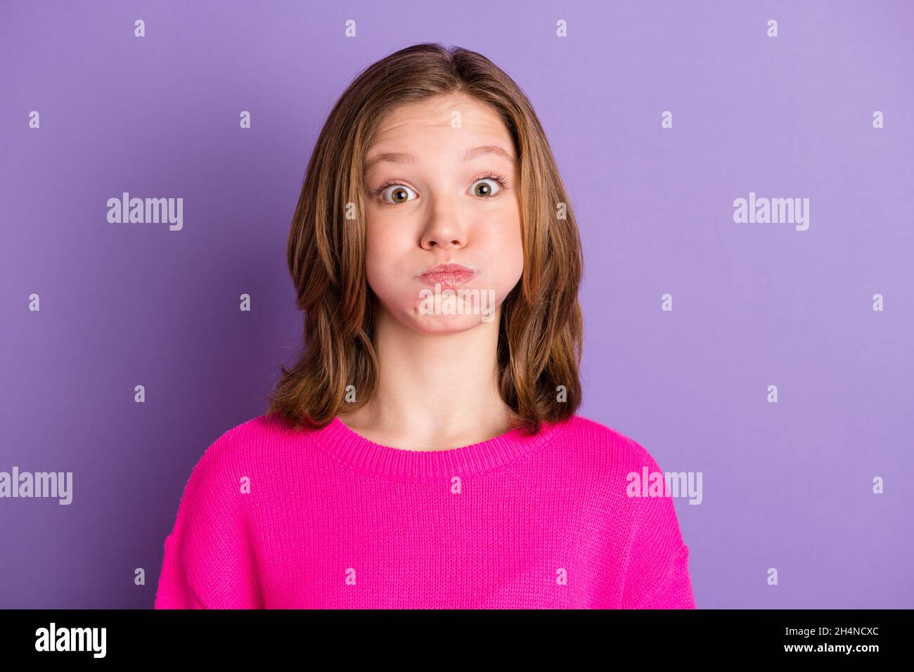 Photo of funky cute cheerful teenage girl hold breath cheeks funny face ...