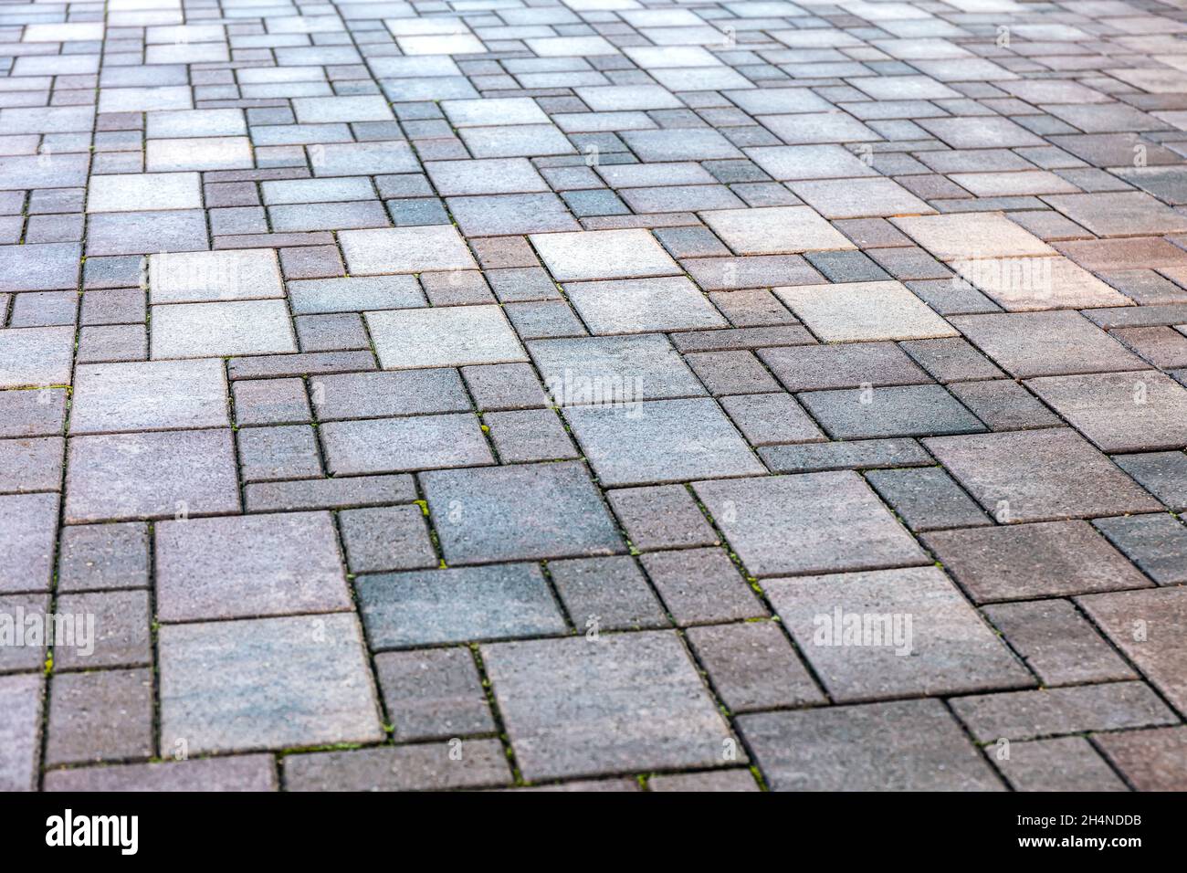 wet concrete block sidewalk after rain. grey modern pavement background ...