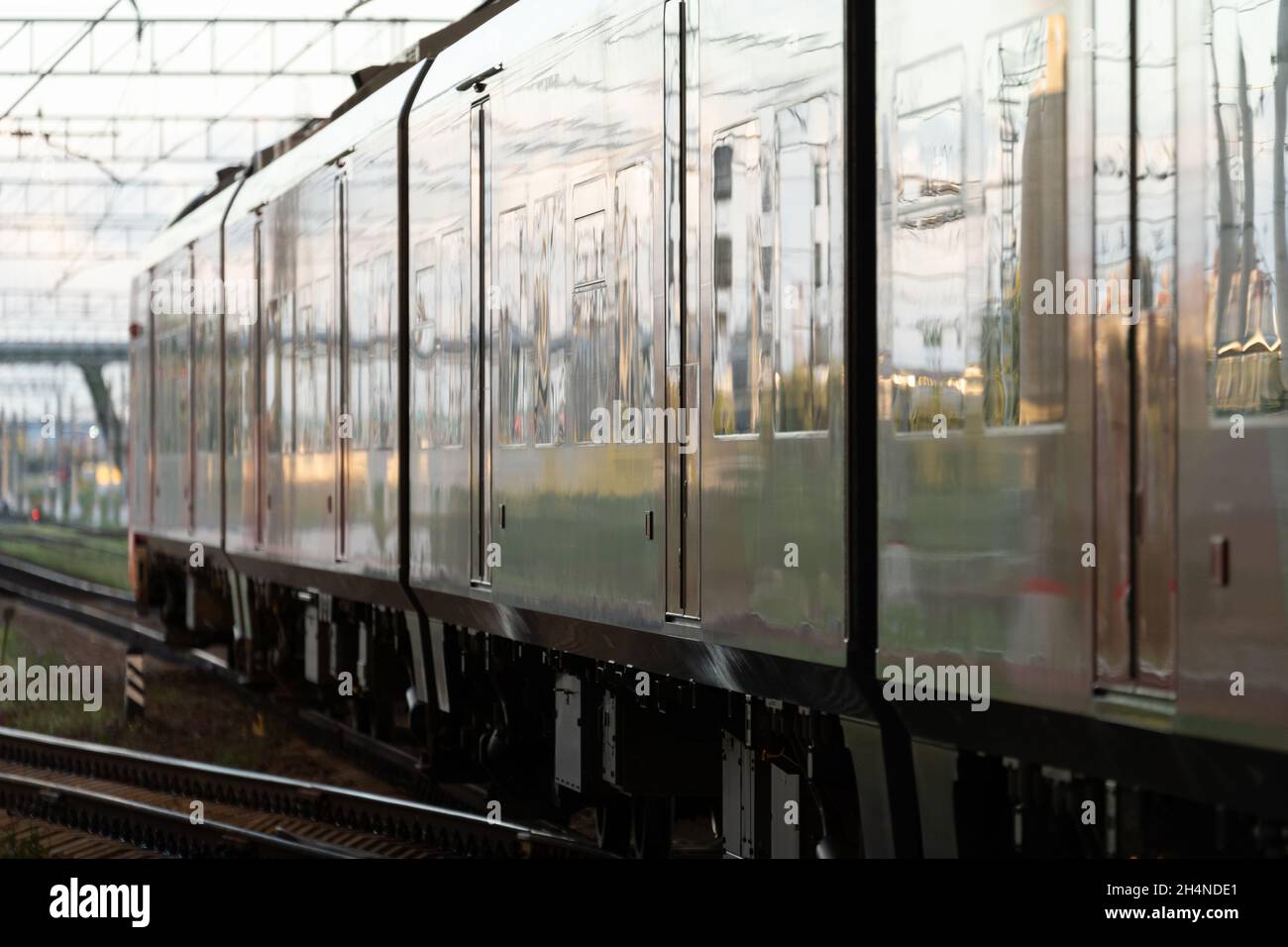 Train arrival: outside view of modern compartment carriage for suburban ...