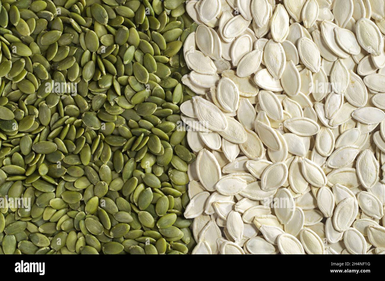 Pumpkin seeds green and unpeeled, top view. Food background Stock Photo ...