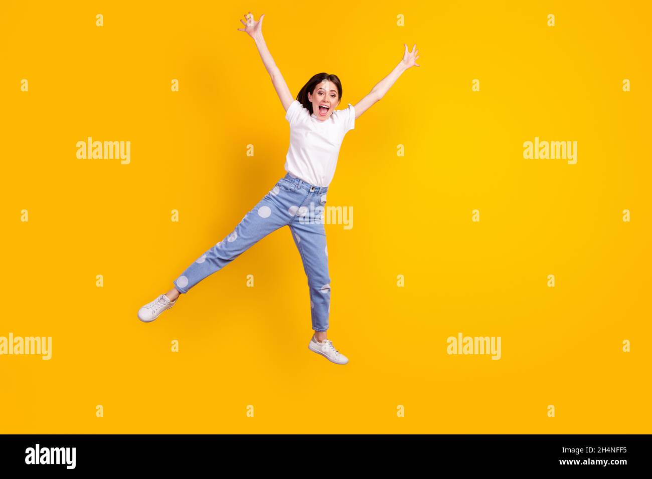 Full body photo of young excited girl happy positive smile jump up ...