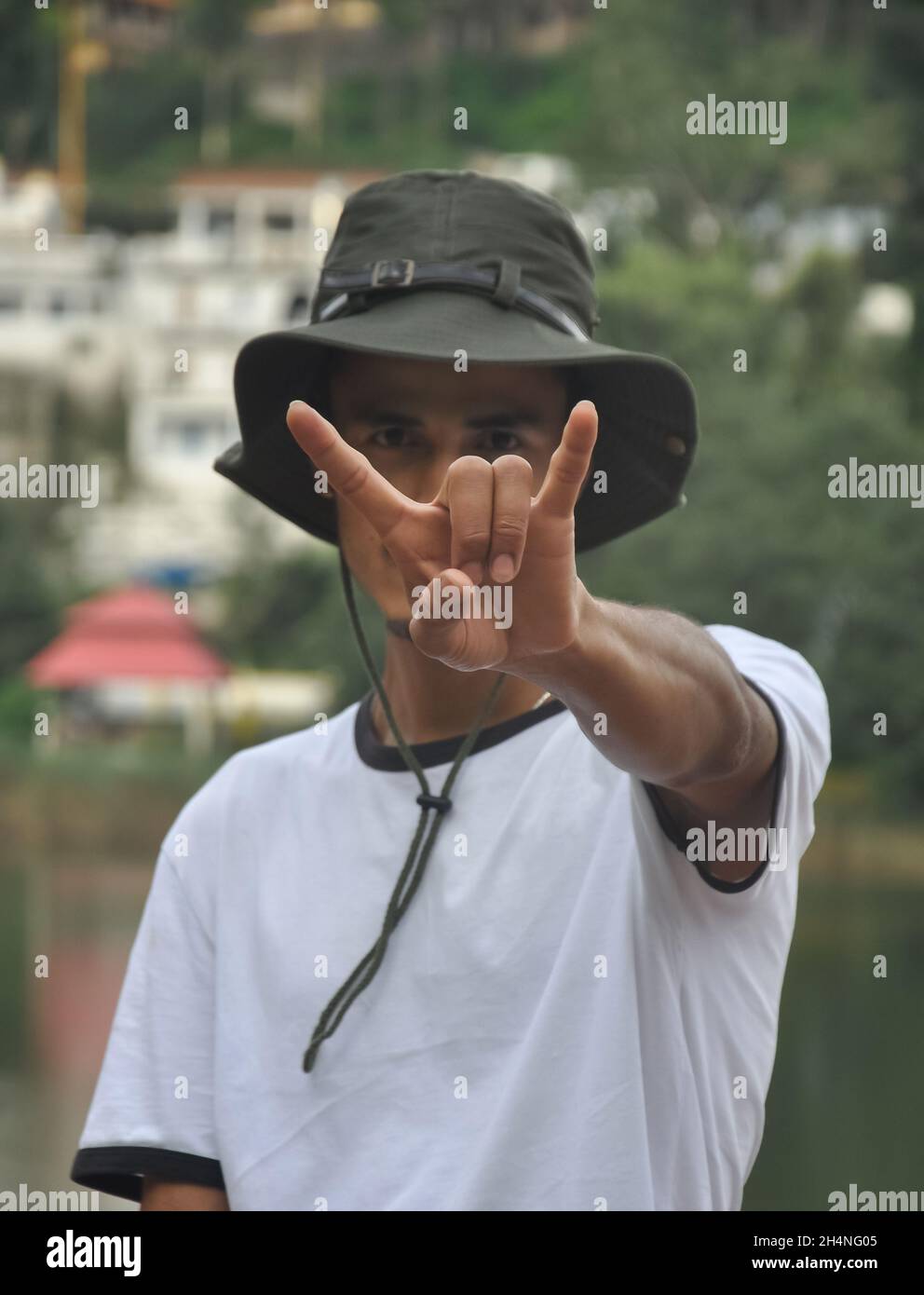 Indian man looking at sign hi-res stock photography and images - Alamy