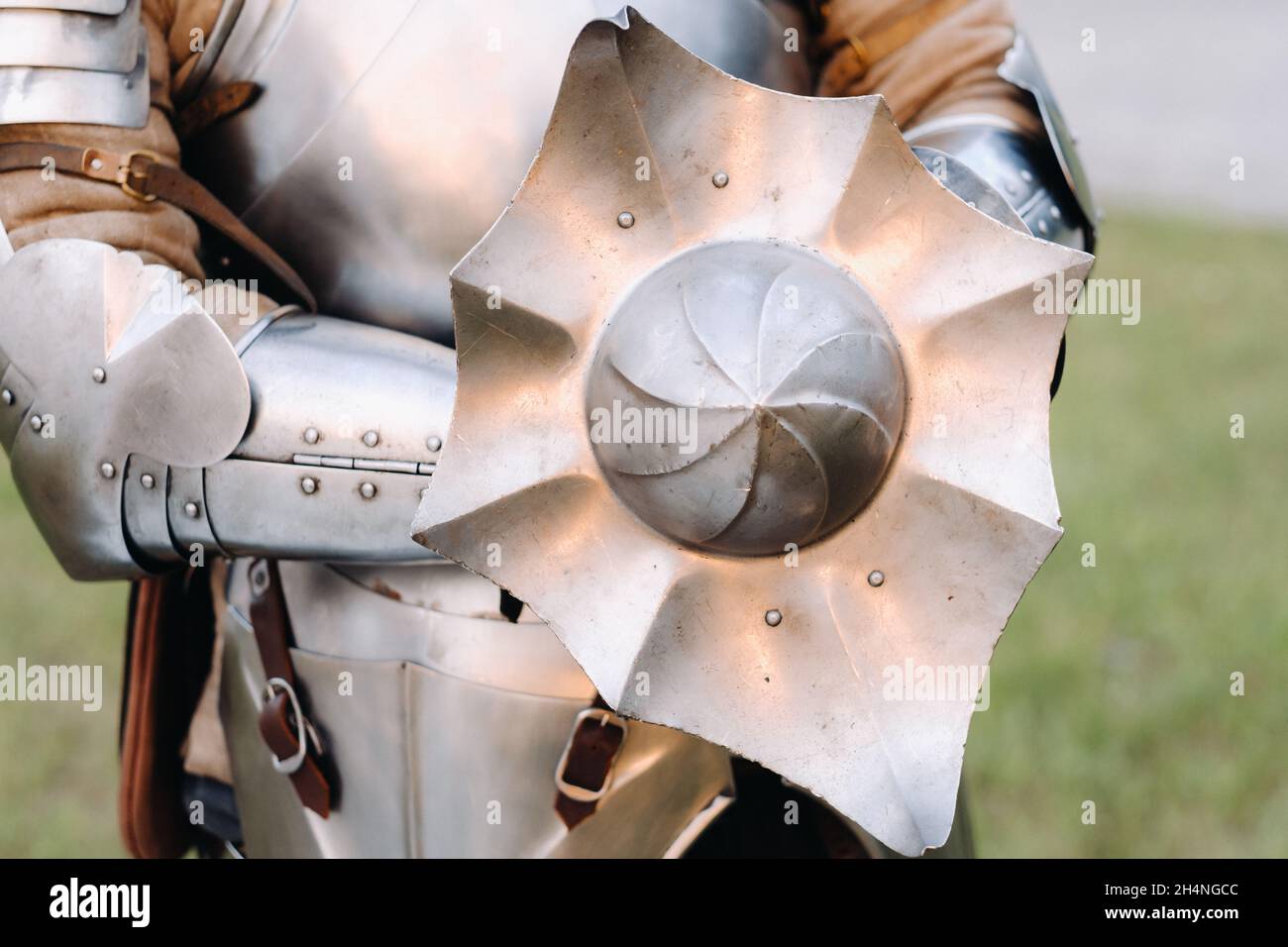 An ancient shield of ancient knight's armor.A medieval concept.Metallic ...