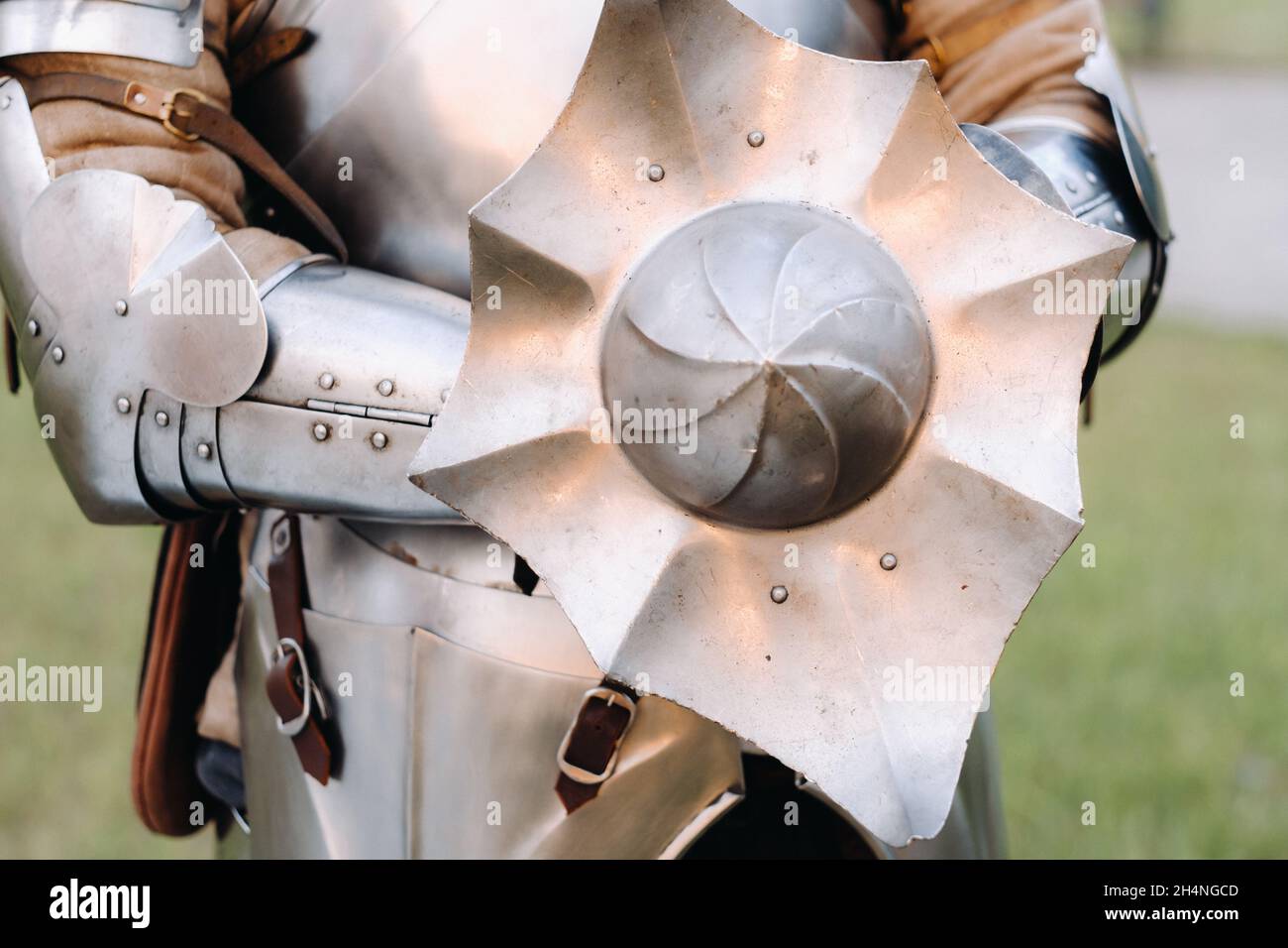 An ancient shield of ancient knight's armor.A medieval concept.Metallic ...