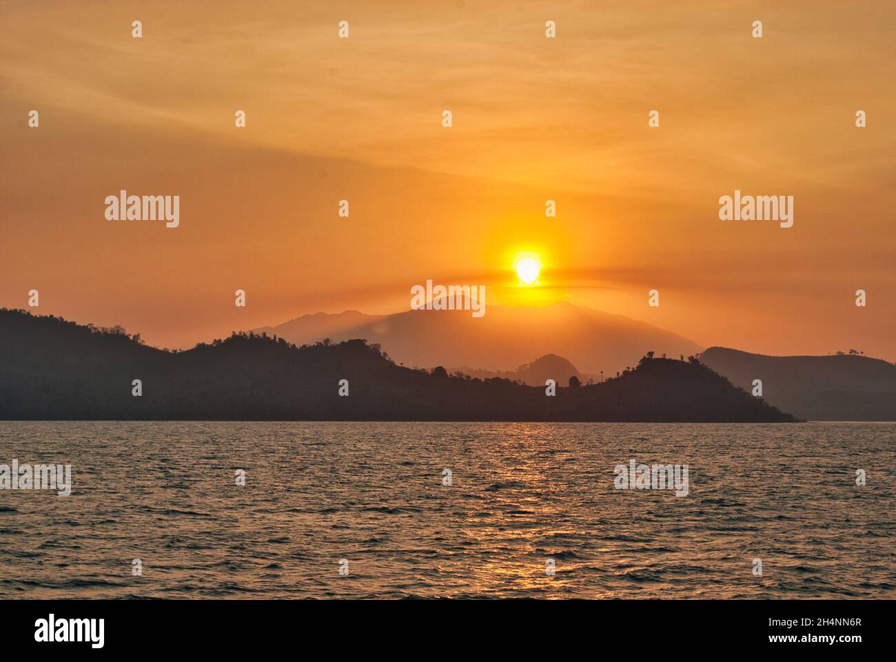 Sunset in the Sunda Straits Stock Photo - Alamy