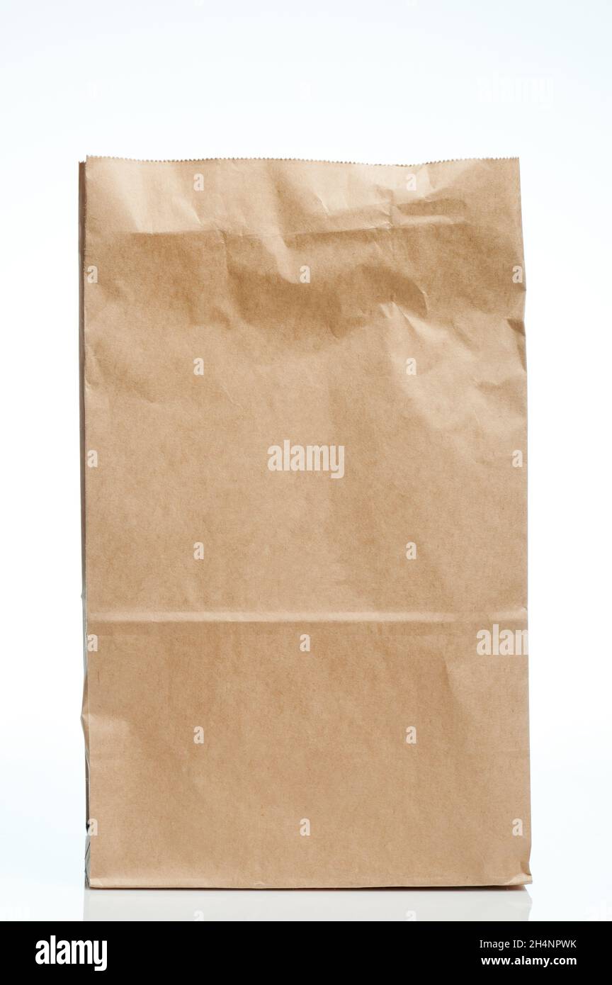 Side view of brown paper bag isolated on white studio background Stock ...