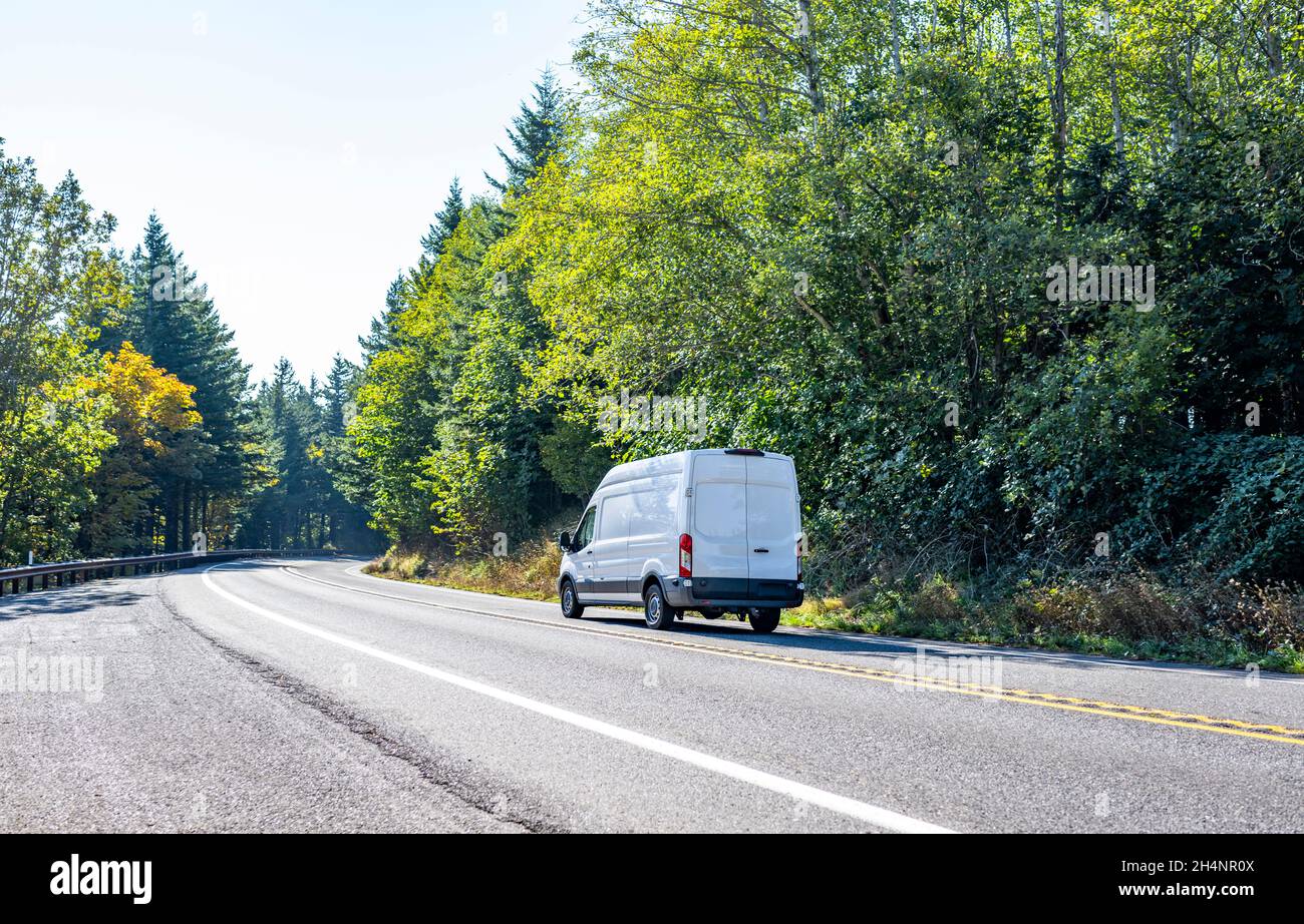 Compact small size white mini van with cargo compartment for local ...