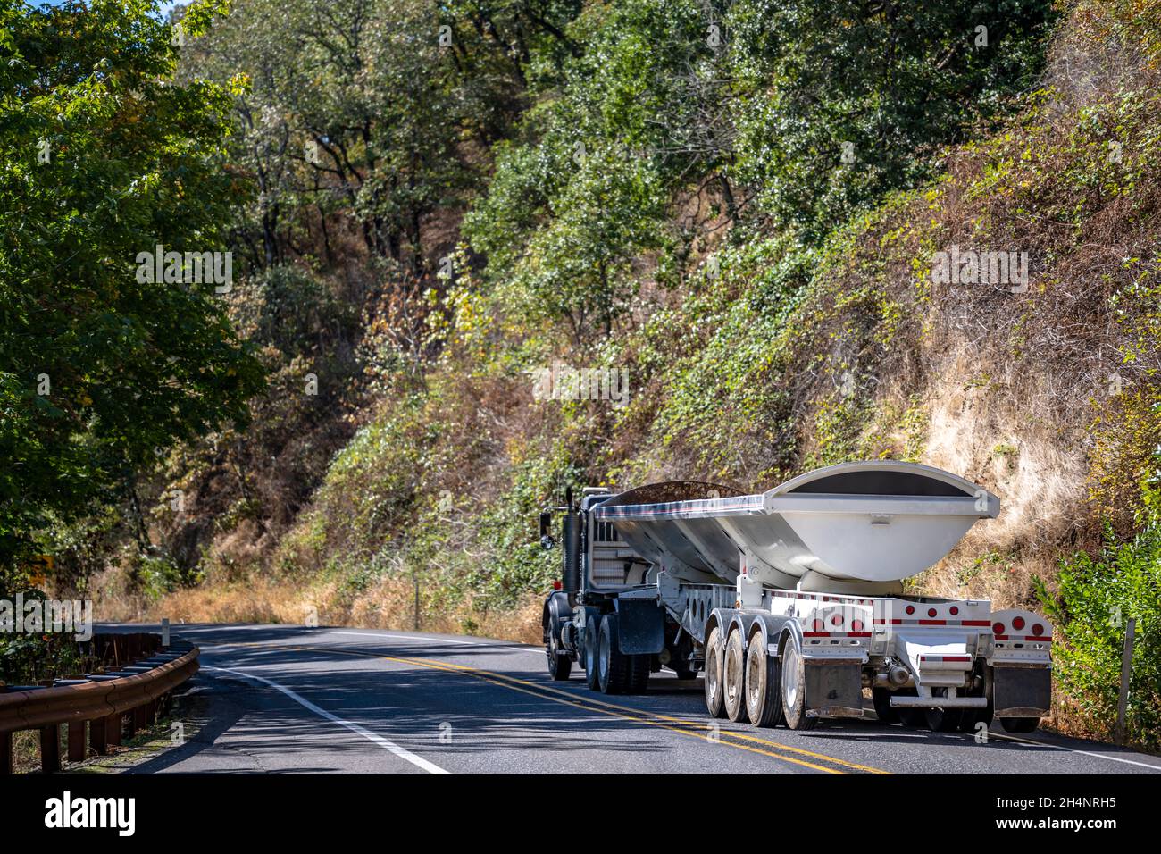 Big rig tipper semi truck with tip trailer transporting commercial ...