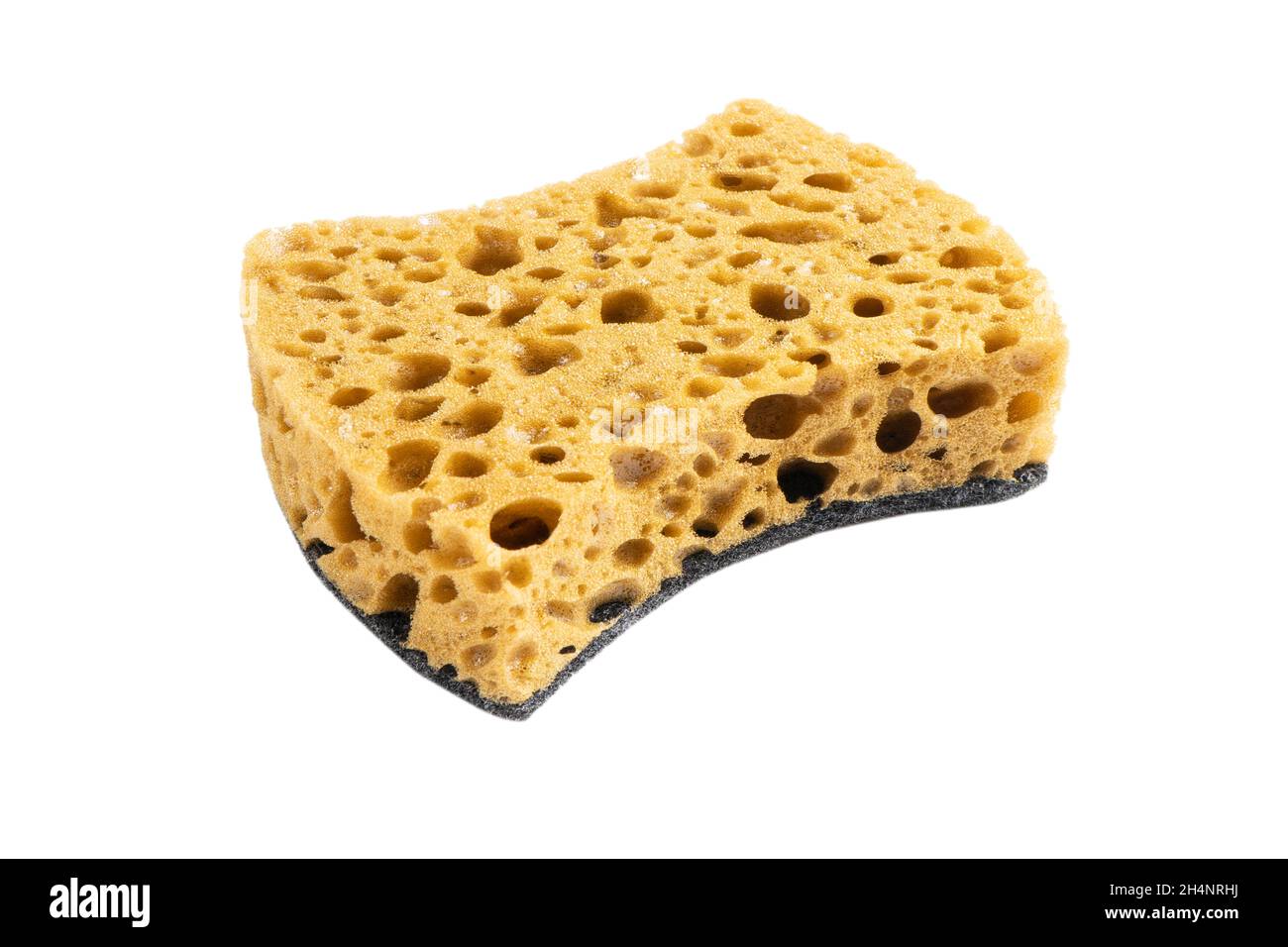 Macro shot of a surface of plastic yellow sponge isolated on white ...