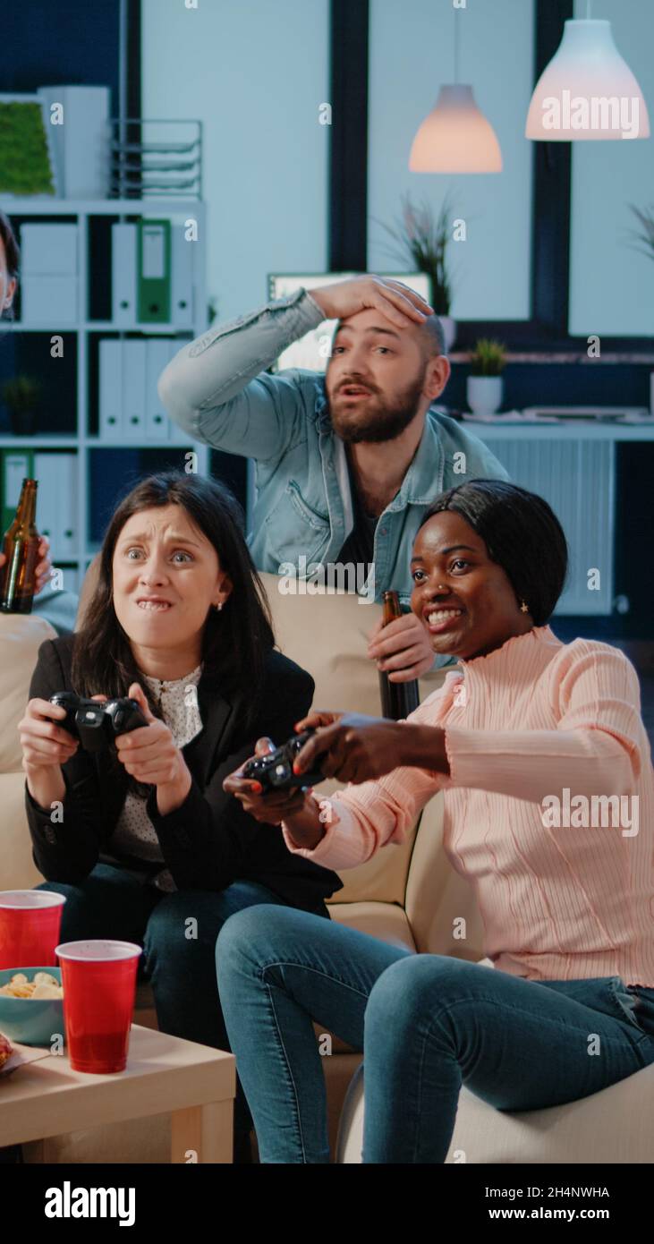 Coworkers playing video games hi-res stock photography and images - Alamy