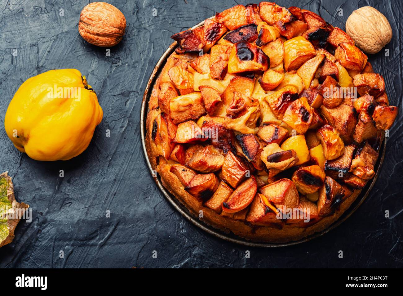 Delicious autumn quince pie. Autumn pastries and quince fruit Stock ...