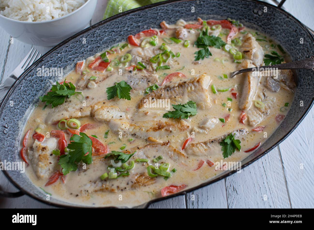 Gluten free and lactose free fish dish with fried redfish fillet ...