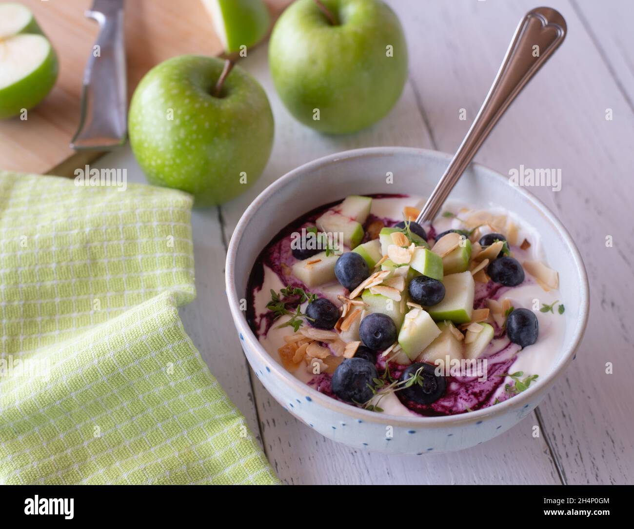 grain free breakfast bowl with skyr, fruits and almonds. Served on ...