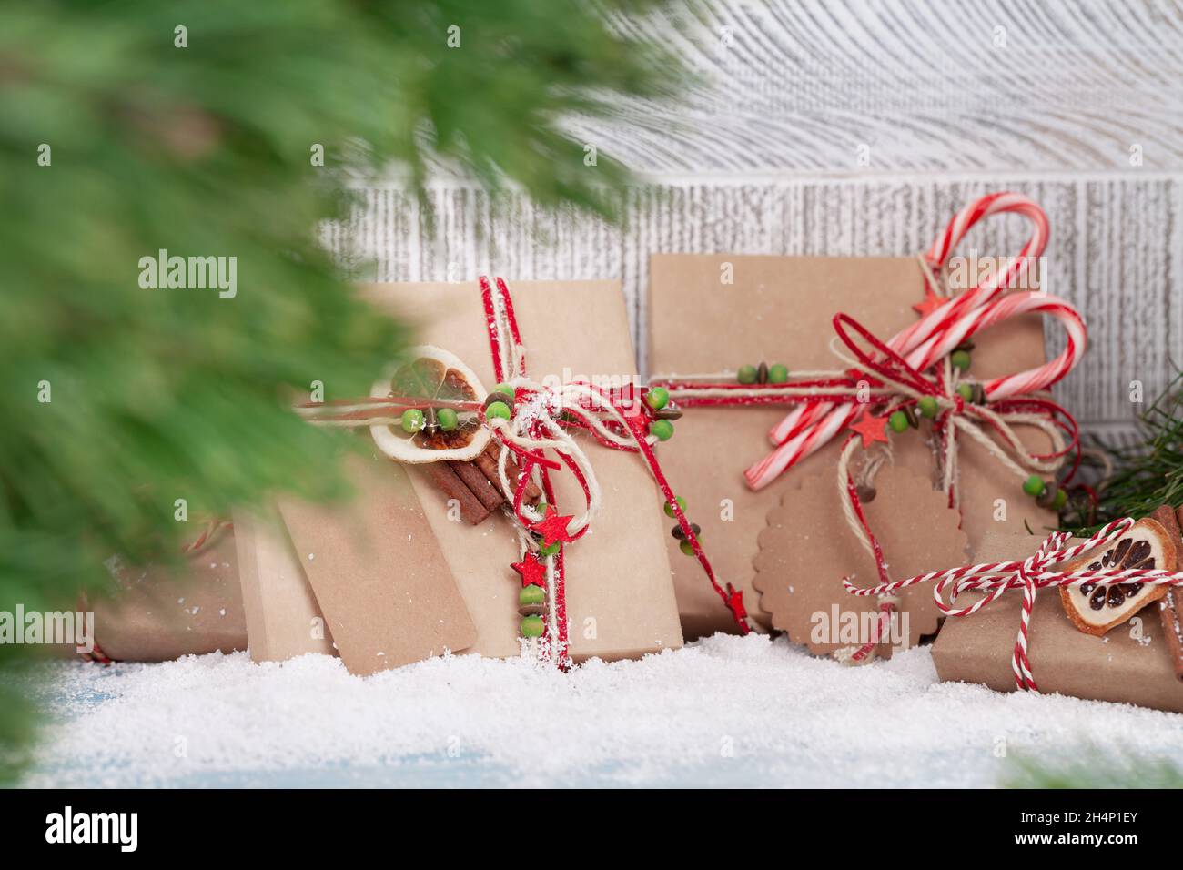 Christmas gift boxes with craft decor Stock Photo - Alamy