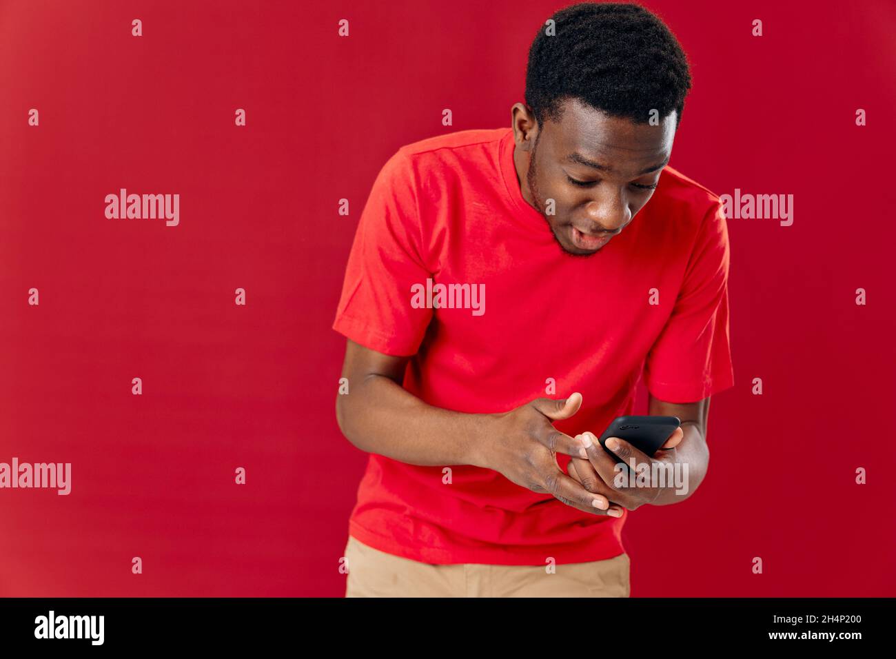 emotional man with a phone in his hands dissatisfaction communication ...