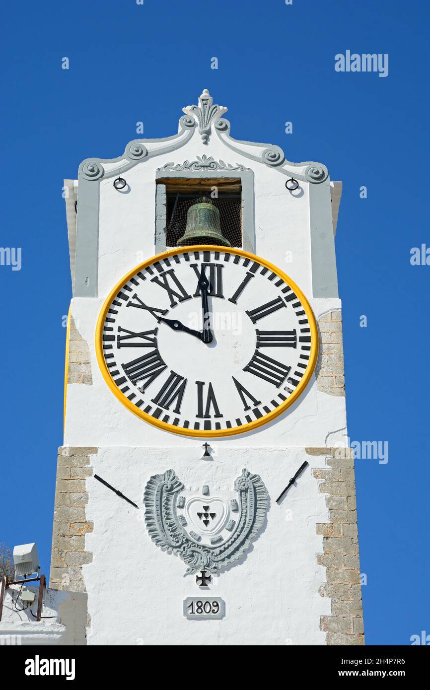 View of the St Marys church (Igreja de Santa Maria do Castelo) clock ...