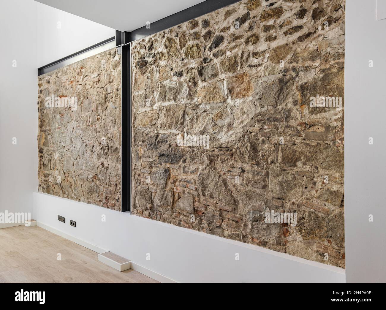 Restored ancient wall left from old city buildings in Barcelona ...