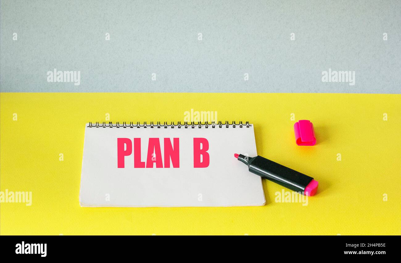 Plan B note with pen on yellow background Stock Photo - Alamy