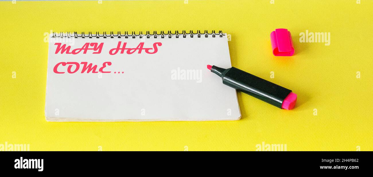 on a yellow background a white notebook with text about the month of ...