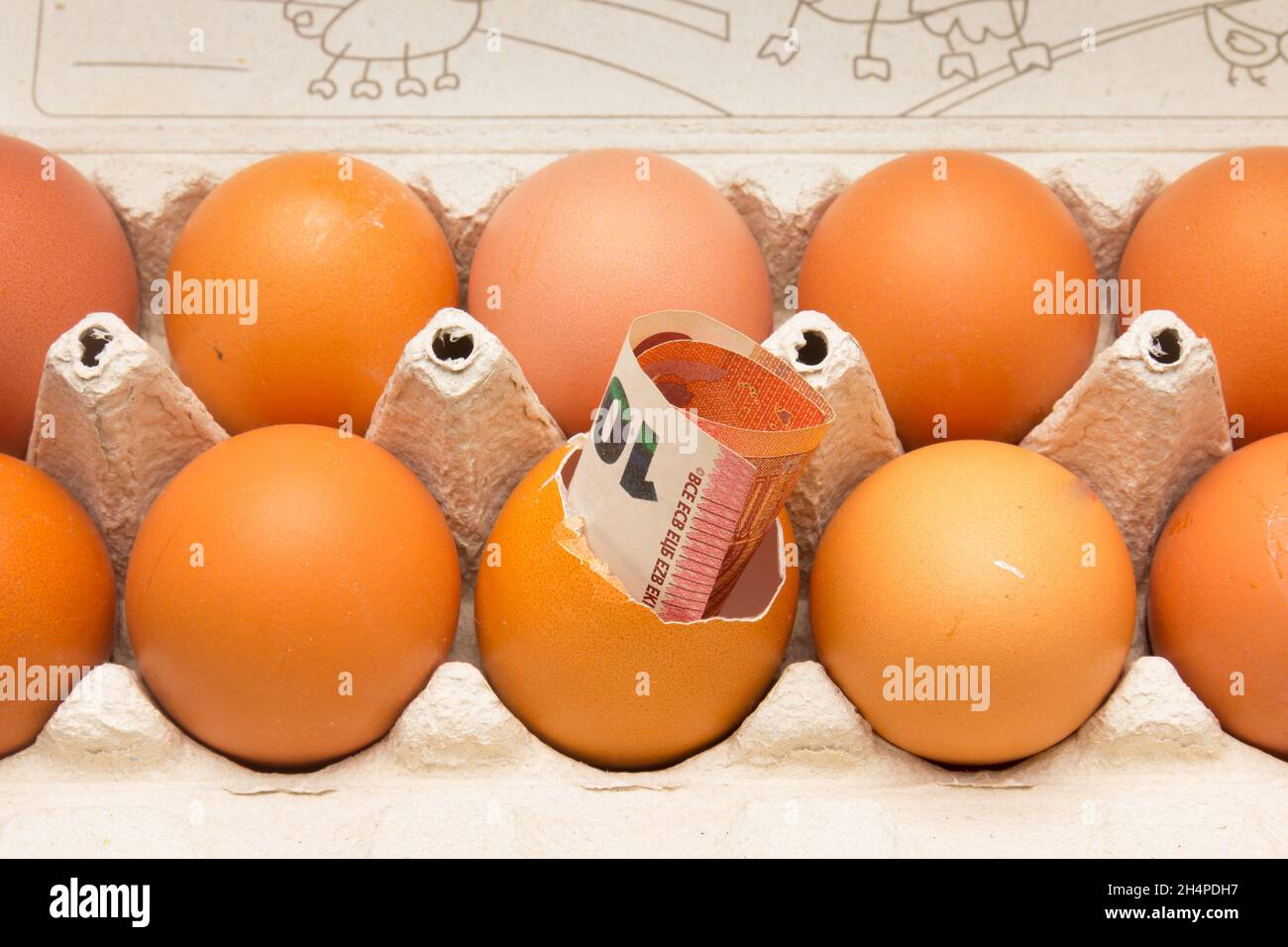 Eggs and money bills Stock Photo - Alamy
