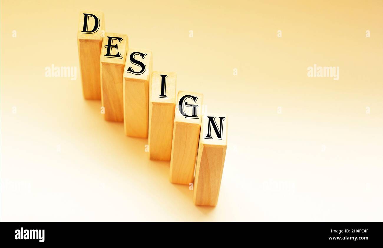 on a yellow background wooden blocks with text design Stock Photo - Alamy