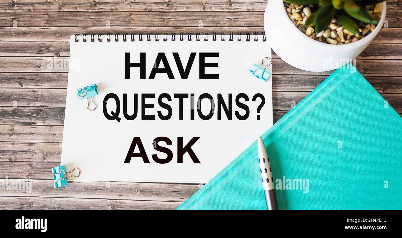 Have questions Ask. Handwriting on notebook with cactus flower and ...