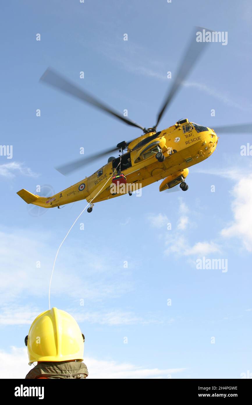 Winch operator helicopter hi-res stock photography and images - Alamy