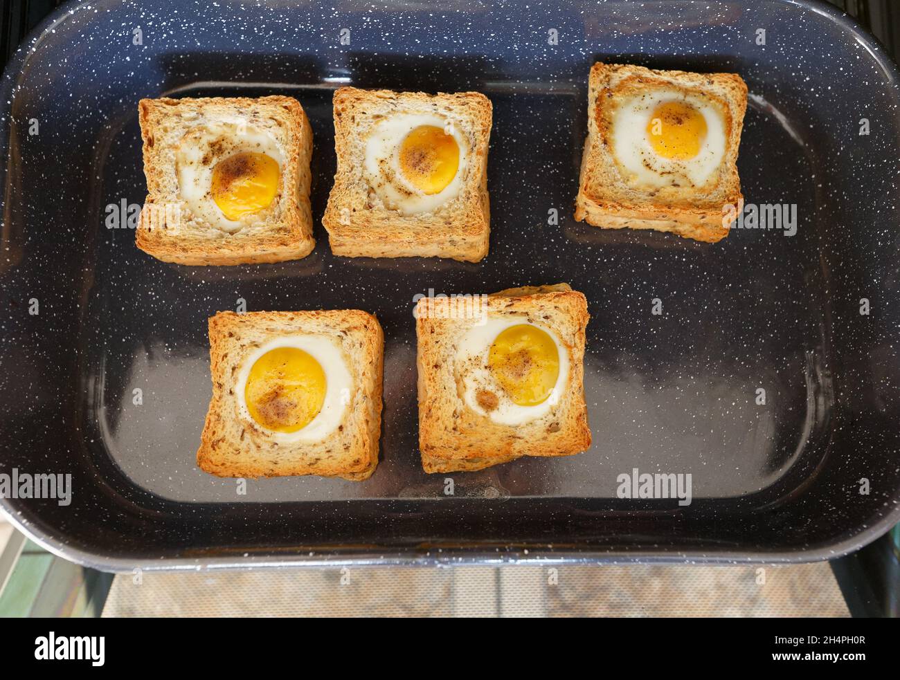 Egg on toasted bread. Top view Stock Photo - Alamy