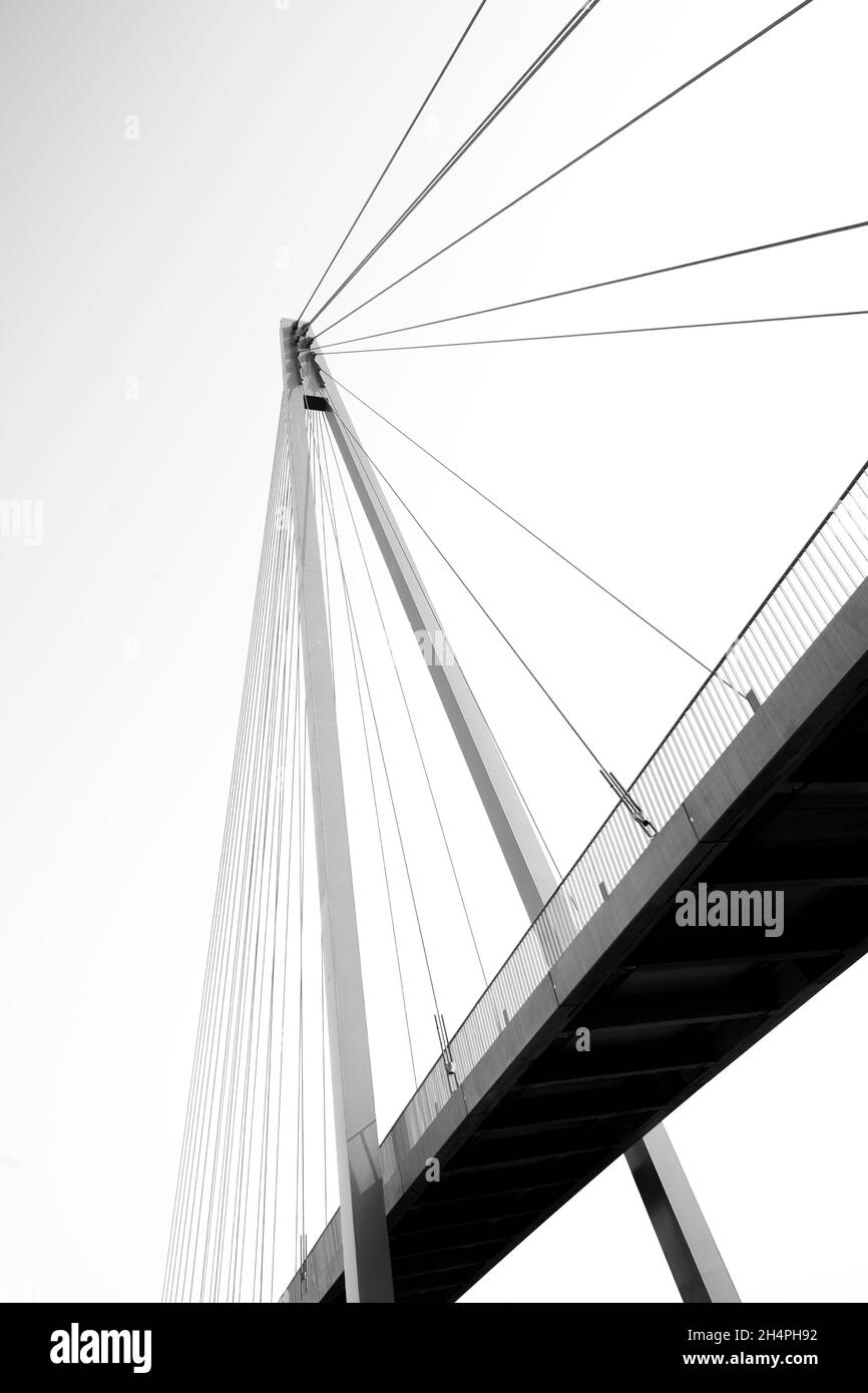Vertical low angle closeup view of a road welded metal cable-stayed ...