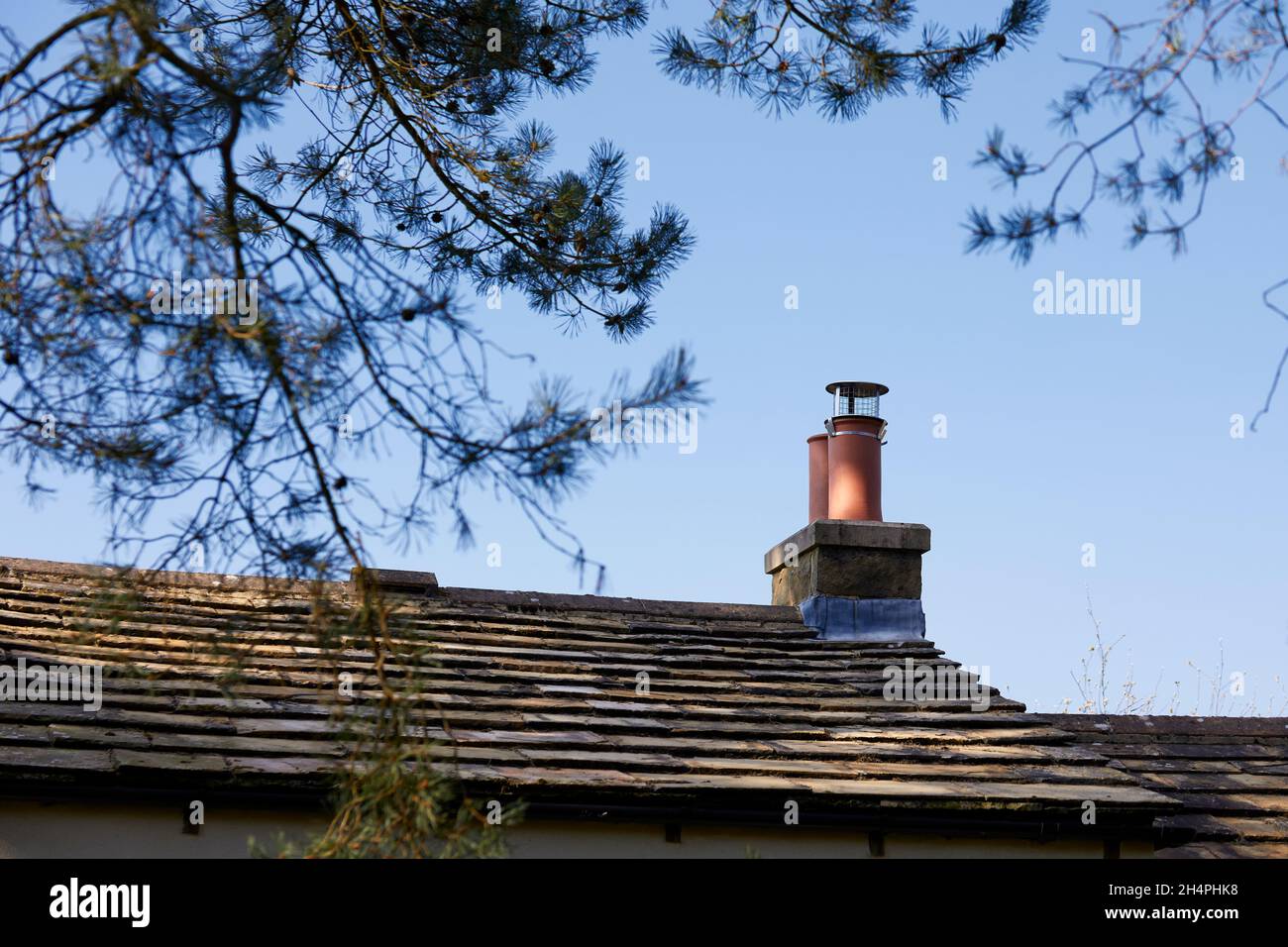 With lead flashing, twin chimneys on traditional Yorkshire moorland ...
