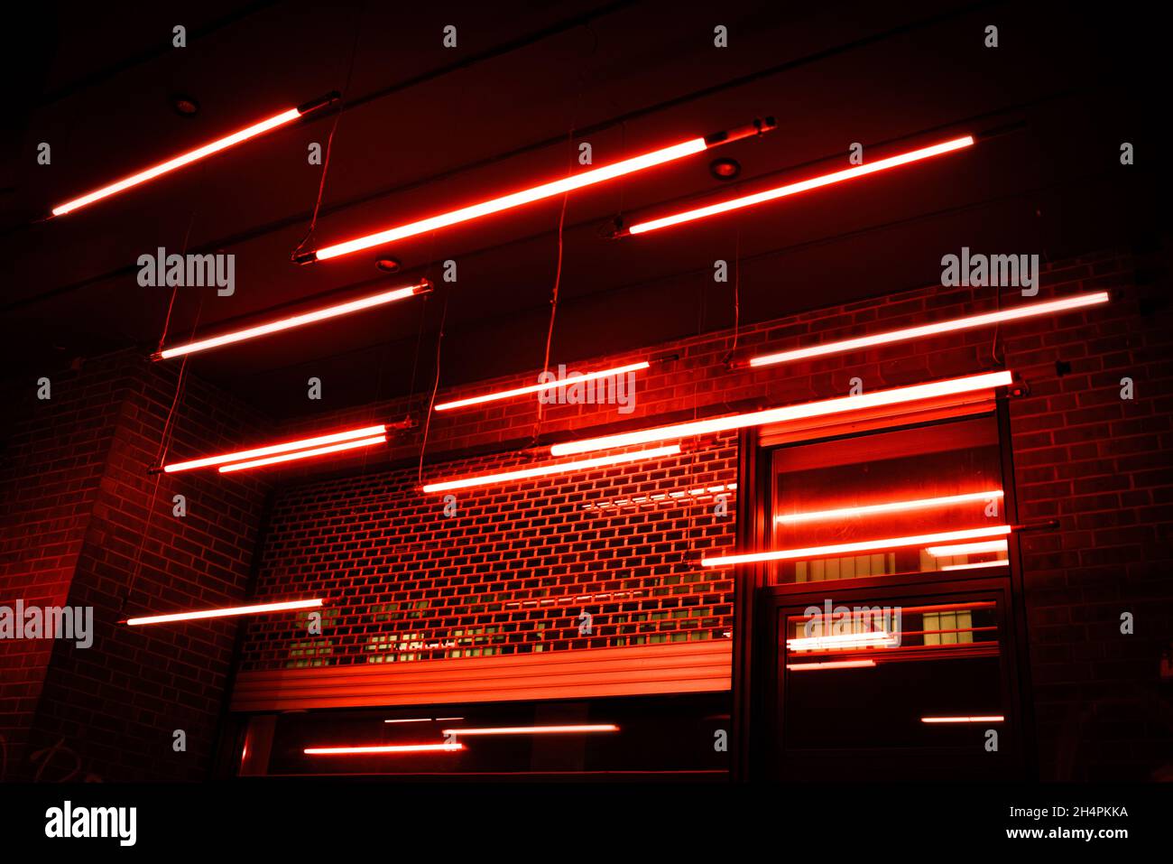 Red neons in the dark Stock Photo - Alamy