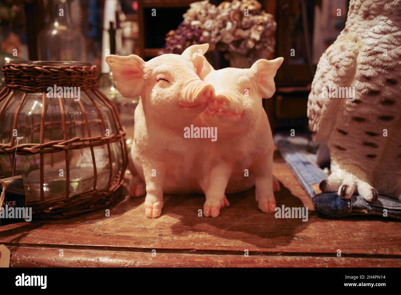 Love pig statue in antique shop Stock Photo - Alamy