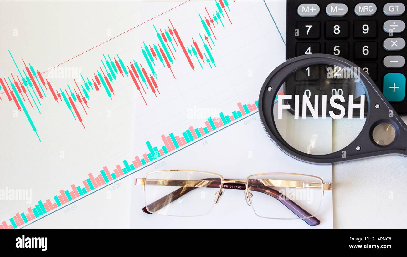 On a white background a magnifier with the text finish, growth graph ...