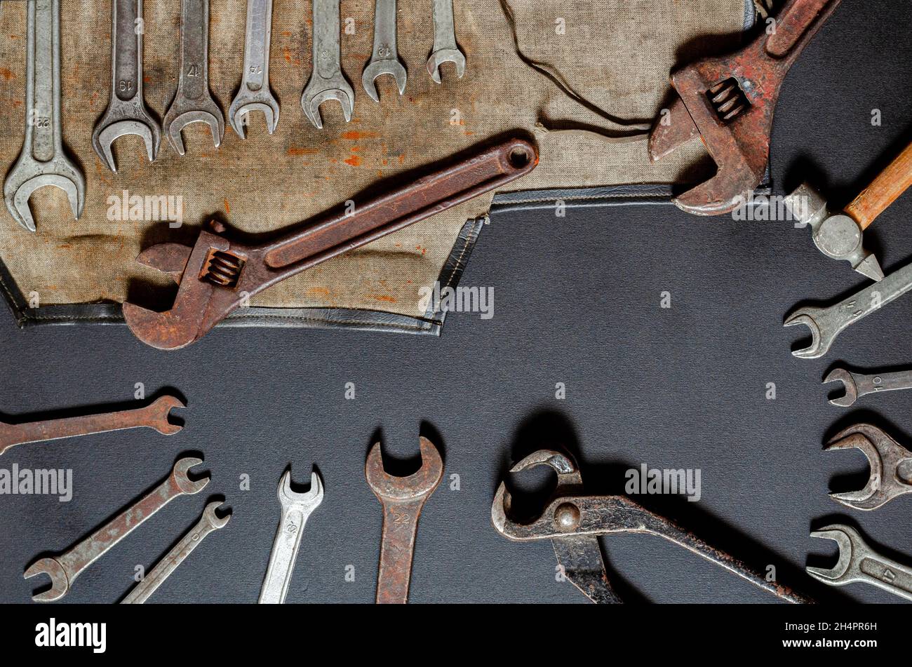Vintage old tools on stone backdrop. Top view with copy space. Flat lay ...