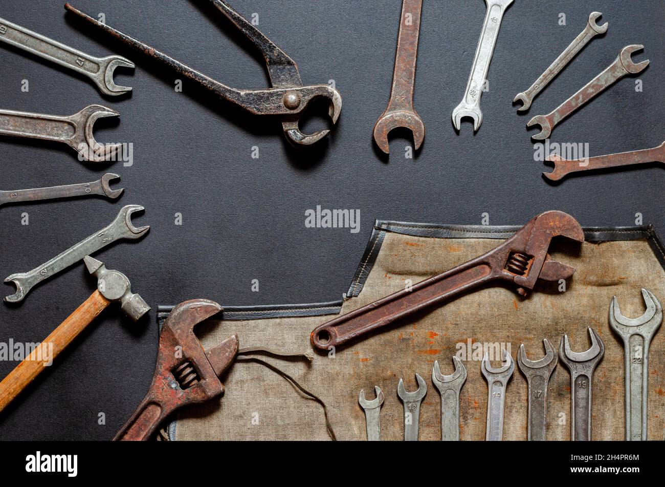 Vintage old tools on stone backdrop. Top view with copy space. Flat lay ...