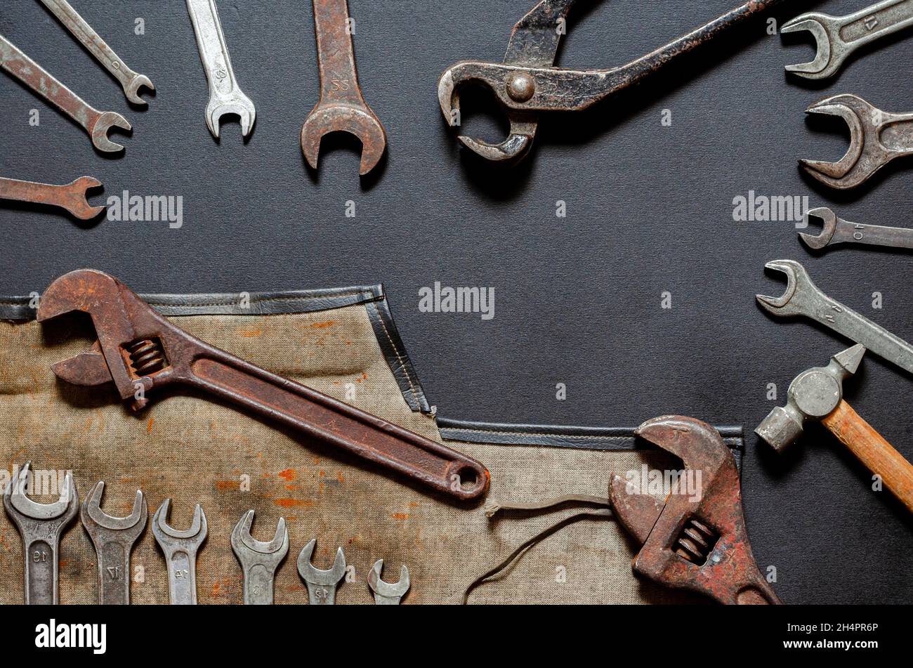 Vintage old tools on stone backdrop. Top view with copy space. Flat lay ...