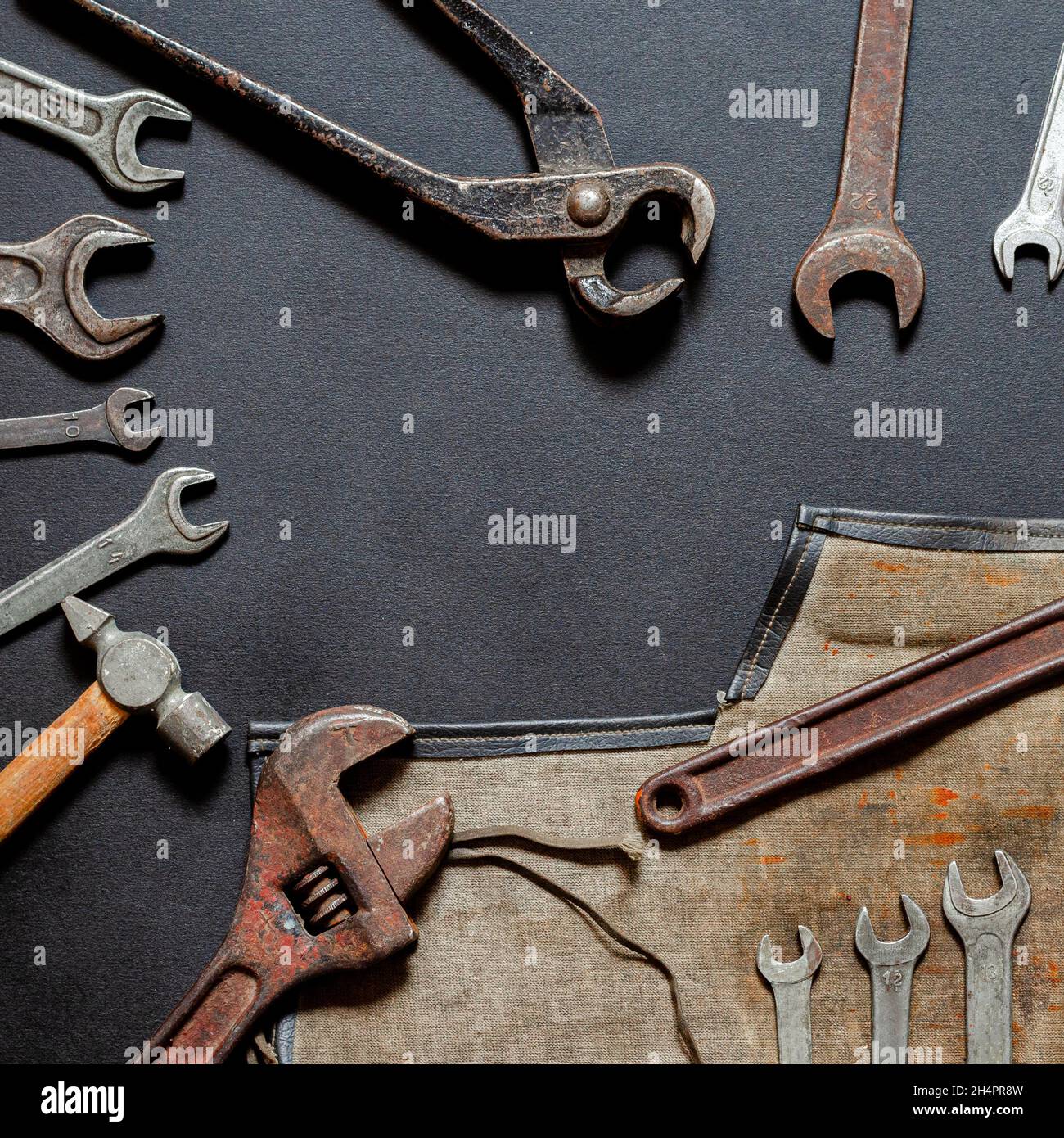 Vintage old tools on stone backdrop. Top view with copy space. Flat lay ...