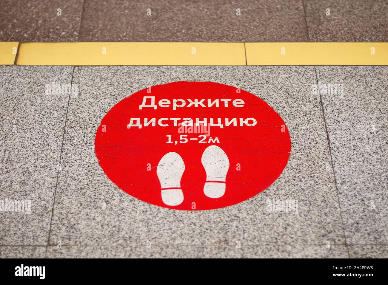 Keep distance sign on the floor in Moscow subway, Moscow, Oct 2021 ...
