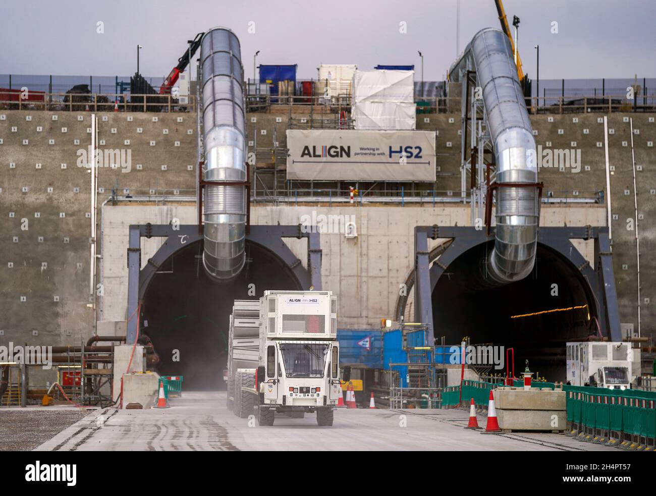 Concrete tunnel segments are taken into the tunnel at the south portal ...