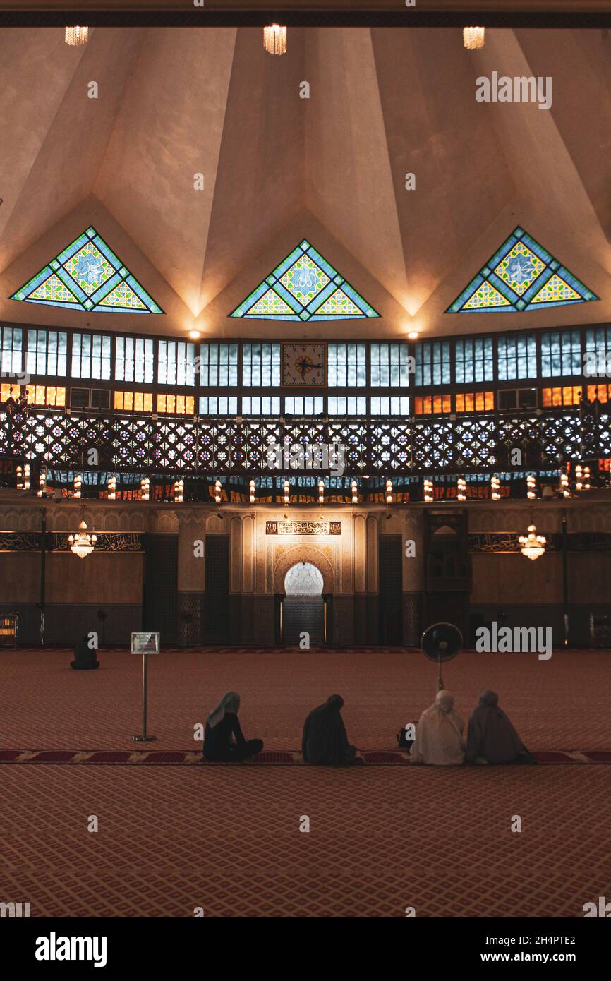 Women inside a mosque hi-res stock photography and images - Alamy