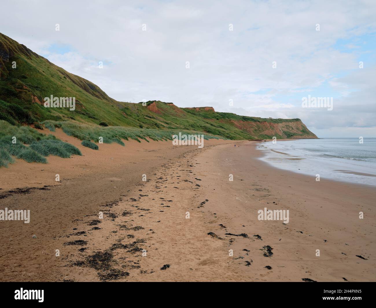 The empty sandy beach at Skinningrove Cleveland North Yorkshire England ...