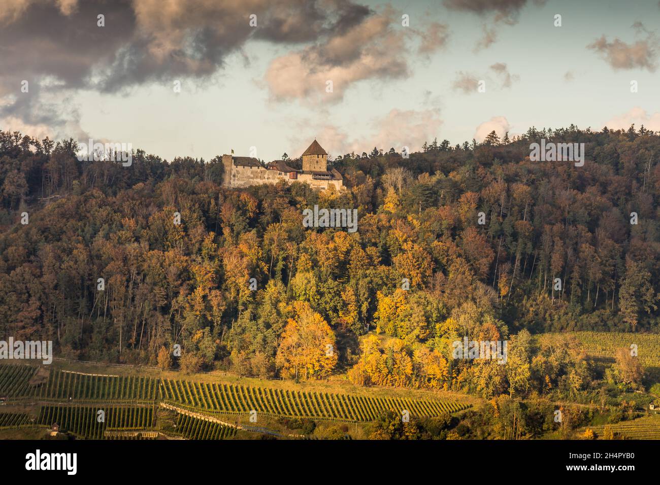 Castle in autumn in evening light Stock Photo - Alamy