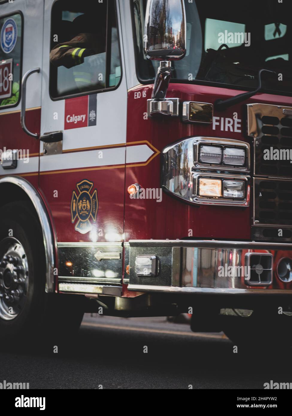 Vertical shot of the Calgary Fire Department driving along in Alberta ...