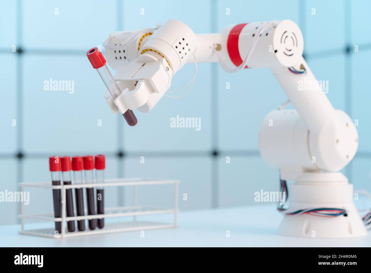Robot arm with test tube for biological experiments in laboratory Stock ...