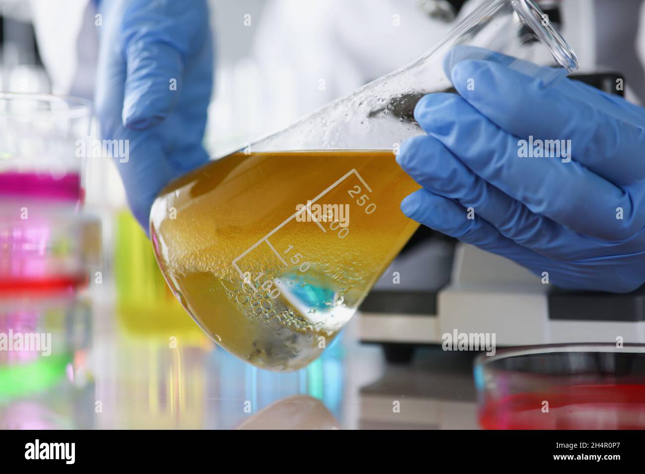 Reaction happens in glass tube Stock Photo - Alamy