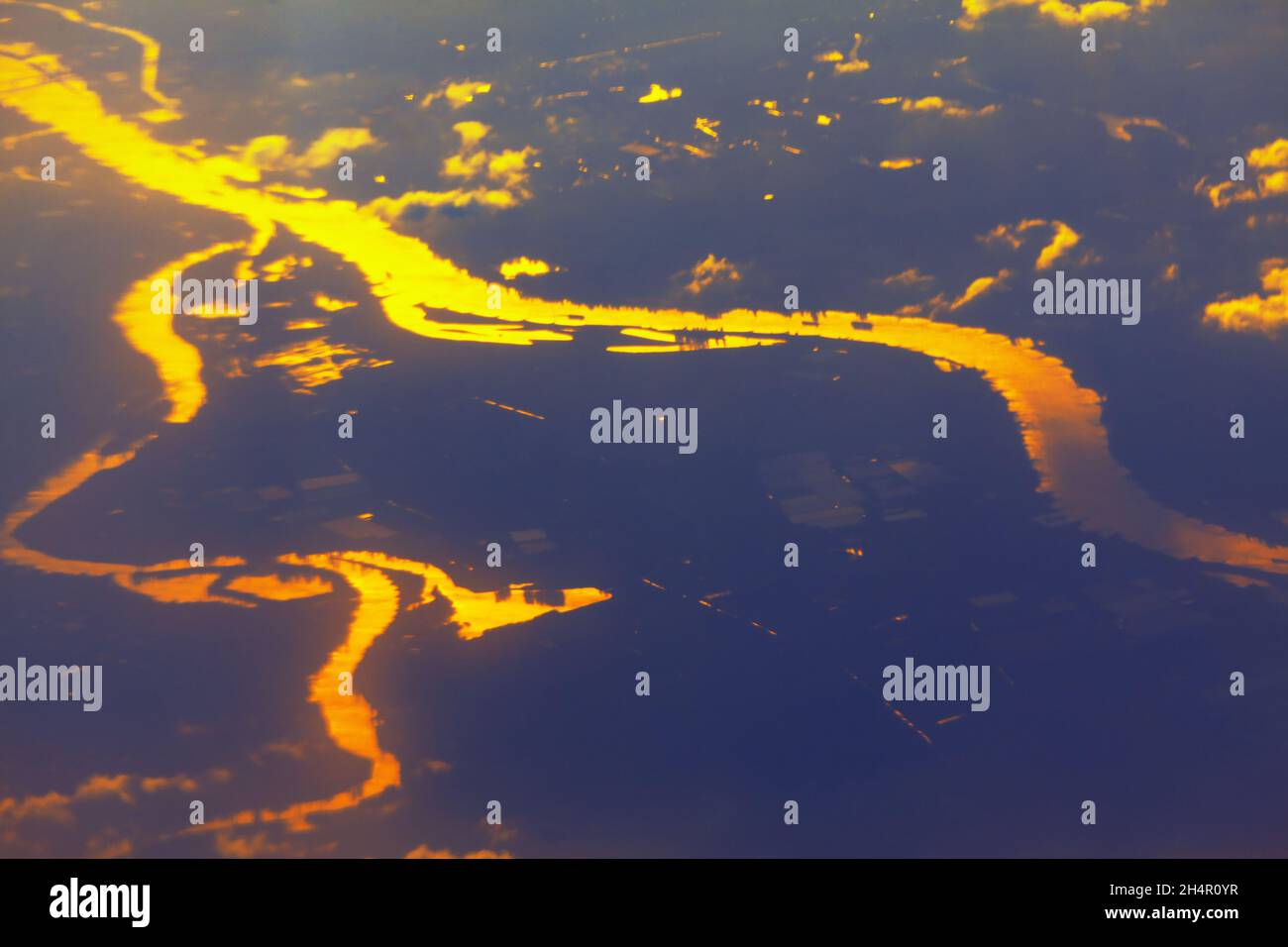 Meanders aerial view . Flowing river in twilight view from above ...