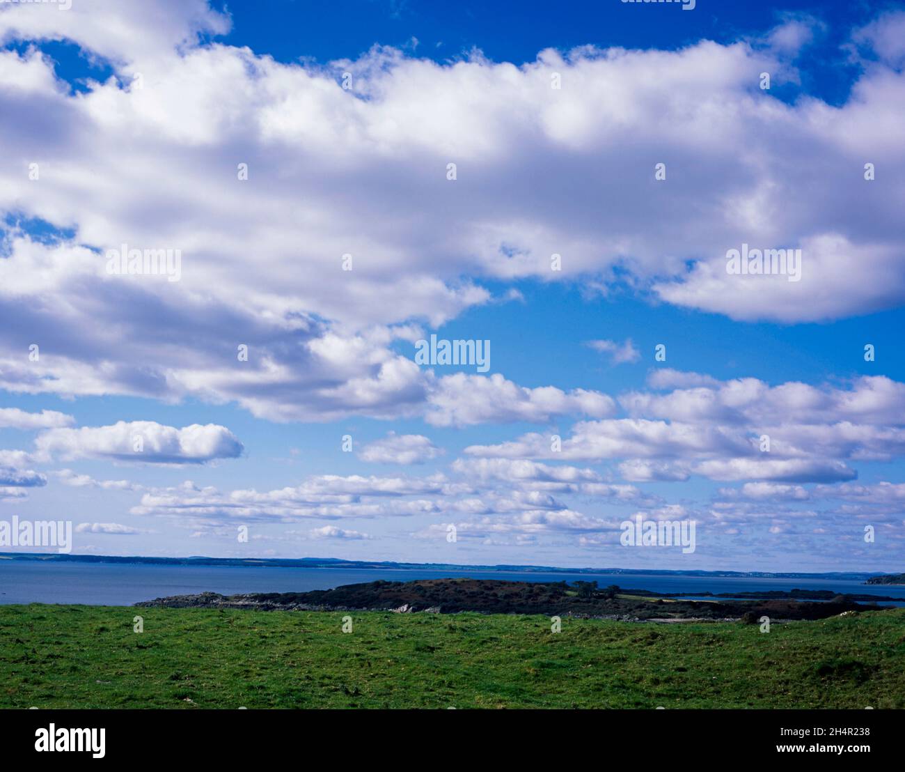 A view across fields and Wigtown Bay to Isle of Whithorn and Wigtown ...